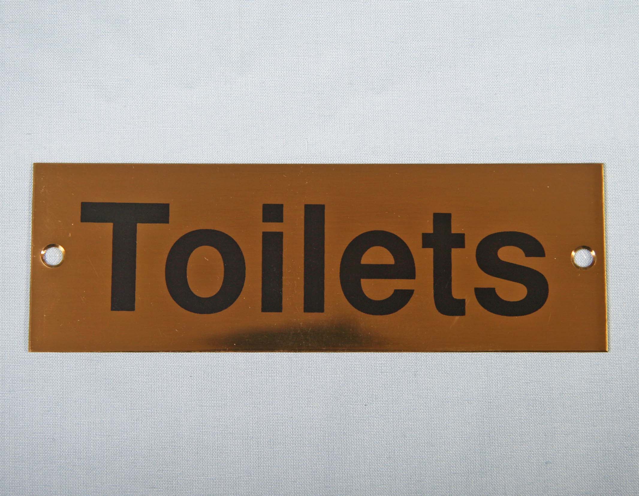 150Mm X 50Mm Polished Brass Toilets Sign